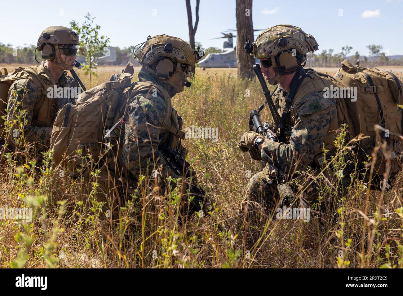 U.S. Marines with Battalion Landing Team 2/1, 31st Marine Expeditionary Unit, discuss troop ...