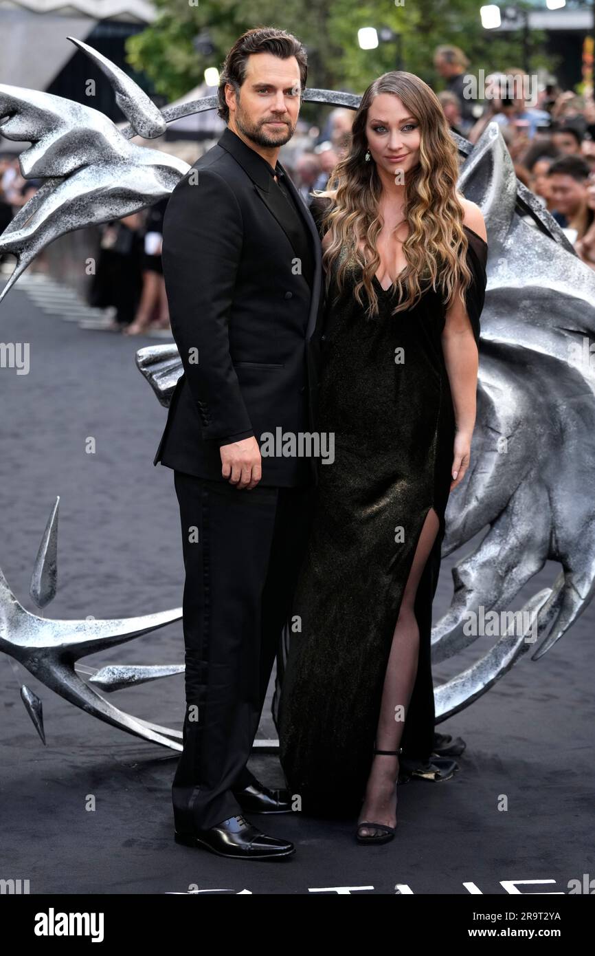 Henry Cavill, left, and Natalie Viscuso pose for photographers upon ...