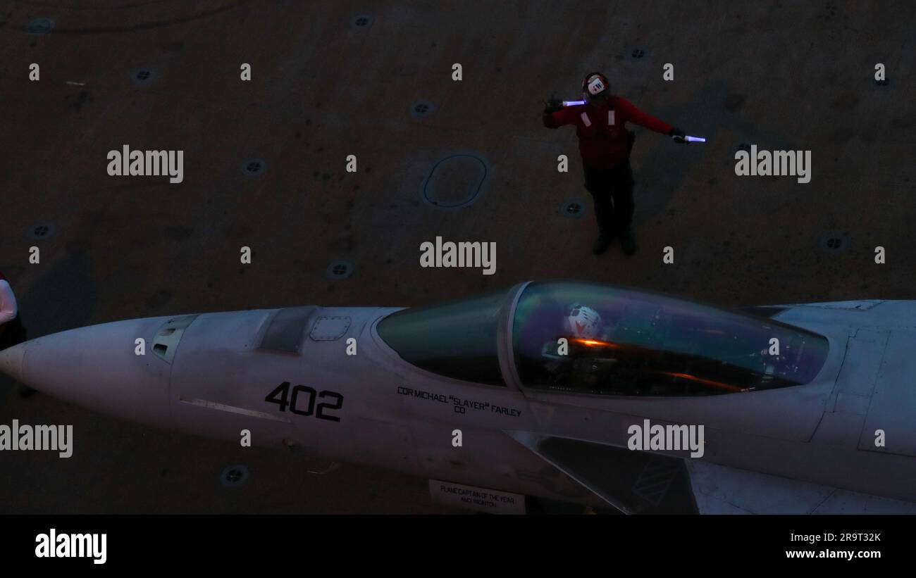 A Sailor assigned to air department aboard the Nimitz-class aircraft ...