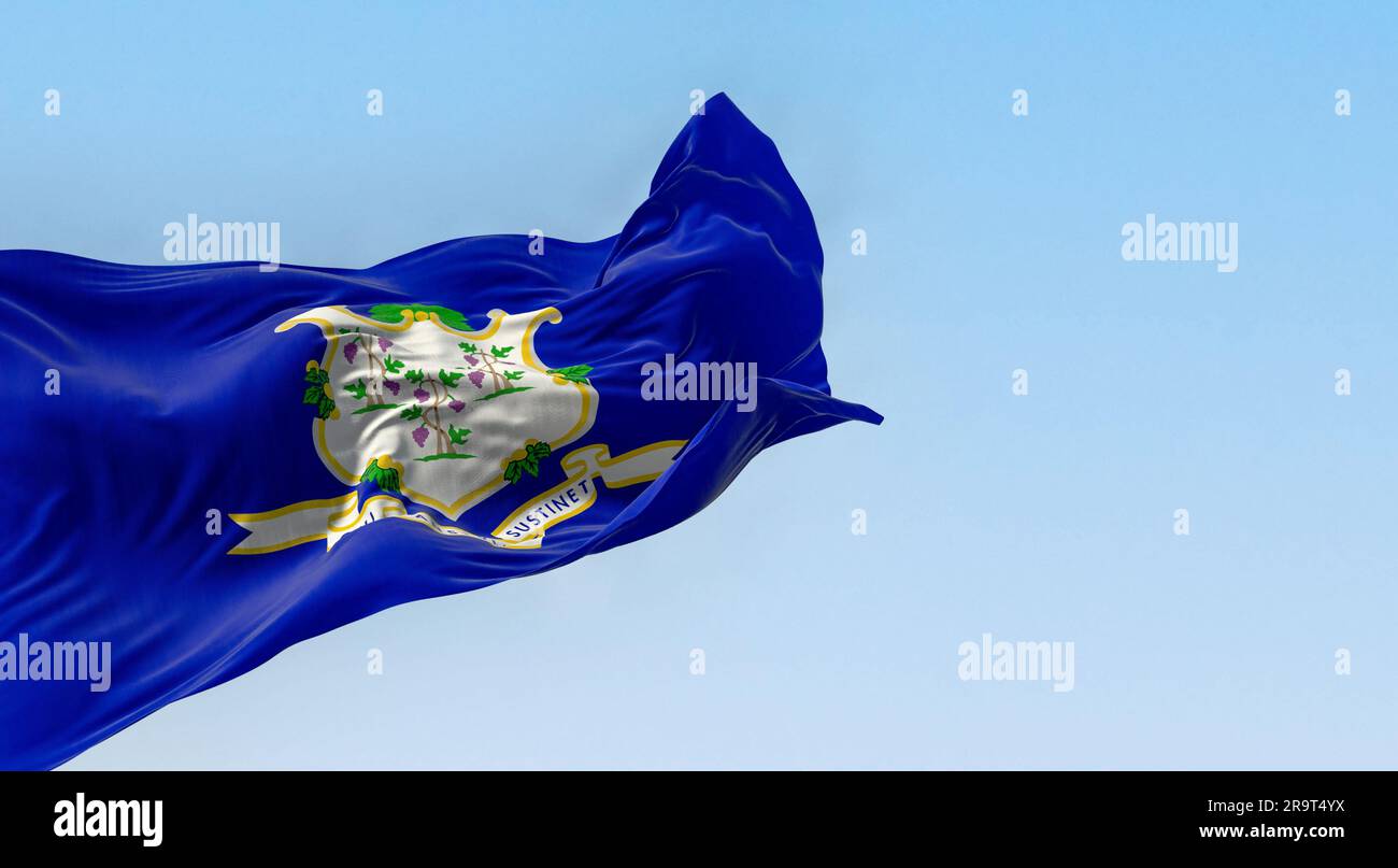 Connecticut state flag fluttering in the wind on a clear day. White ...