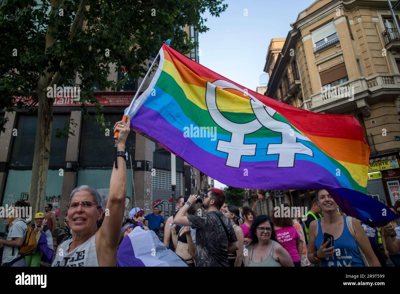 Madrid, Spain. 28th June, 2023. A woman holds the pride flag during the ...