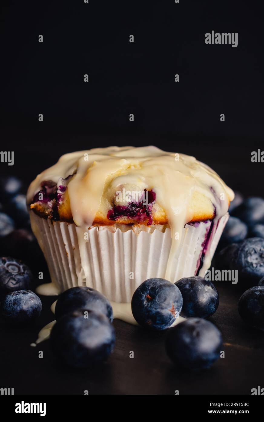 Close-up Side View of Blueberry Muffin With Lemon Glaze: Glazed ...