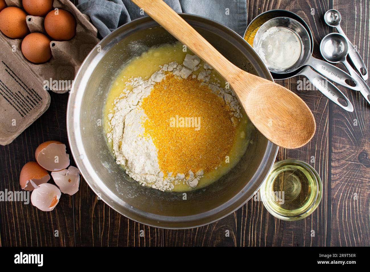 Mixing eggs and flour in bowl hi-res stock photography and images - Alamy