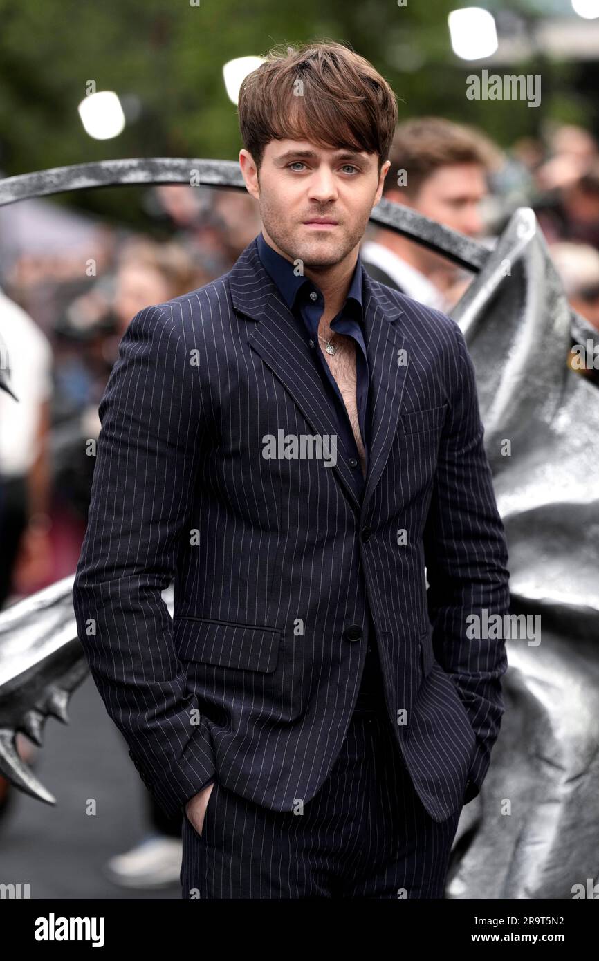 Joey Batey poses for photographers upon arrival at the World premiere ...