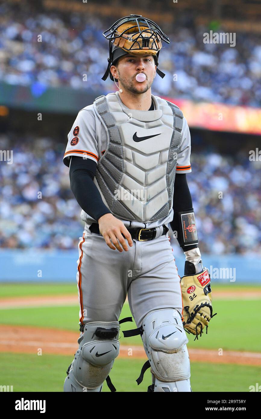 LOS ANGELES, CA - JUNE 17: San Francisco Giants catcher Patrick Bailey (14) blows a bubble ...