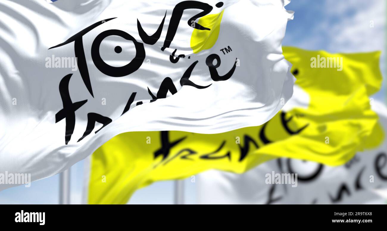 Paris, FR, June 26 2023: Tour de France flags waving. Most important ...