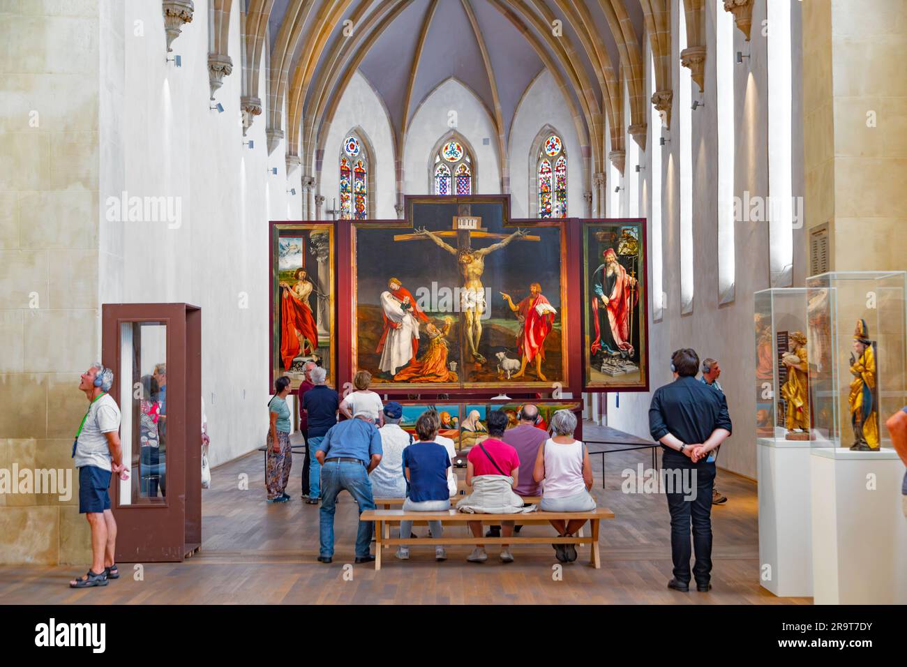 Colmar, France – June 21, 2023: people admire the Isenheim Altarpiece ...