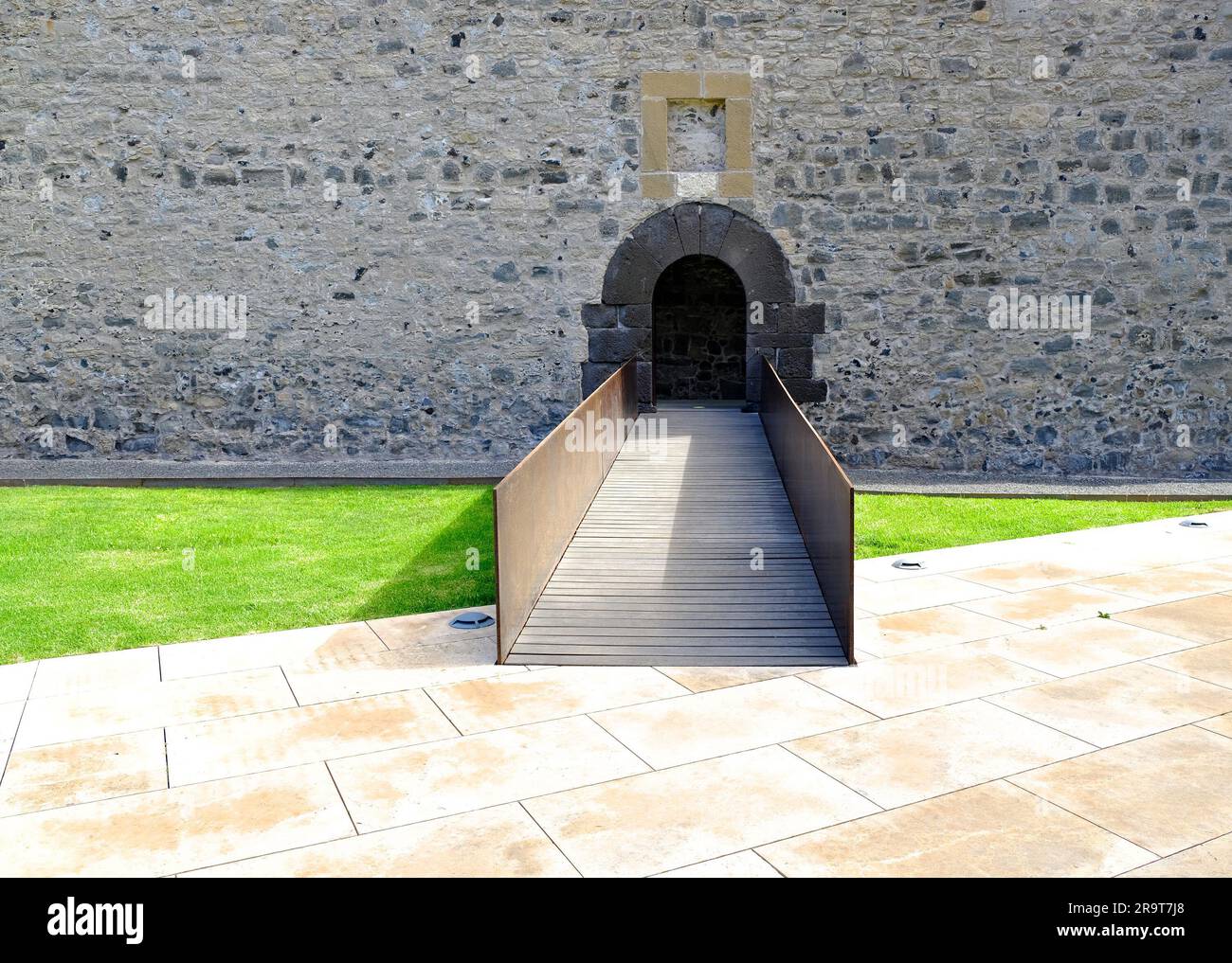 Entrance to a castle museum, ancient stone wall, Middle Ages ...