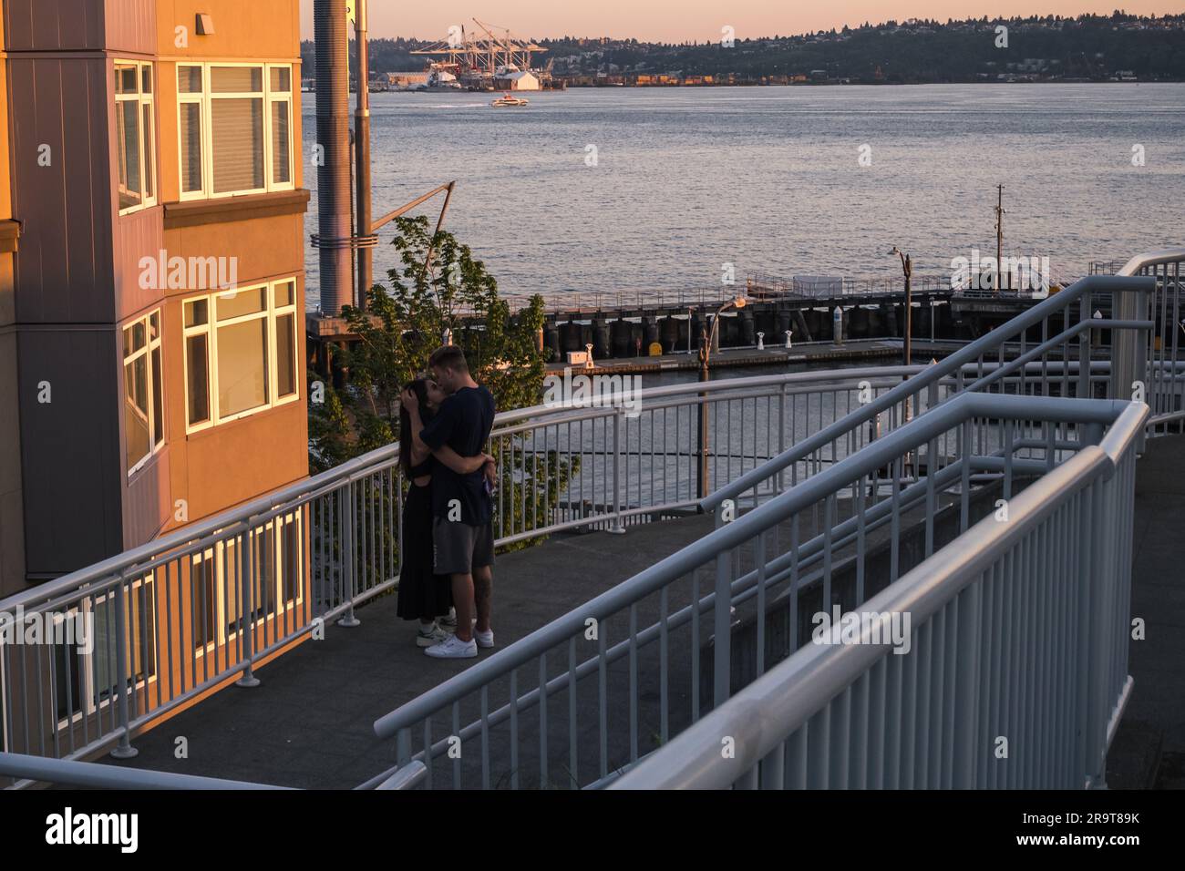 Seattle, USA. 18th May, 2023. Two people embracing on the waterfront ...