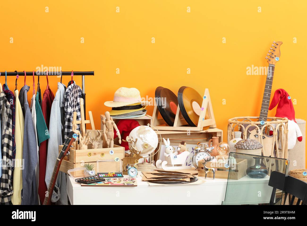 Many different items in room. Garage sale Stock Photo - Alamy