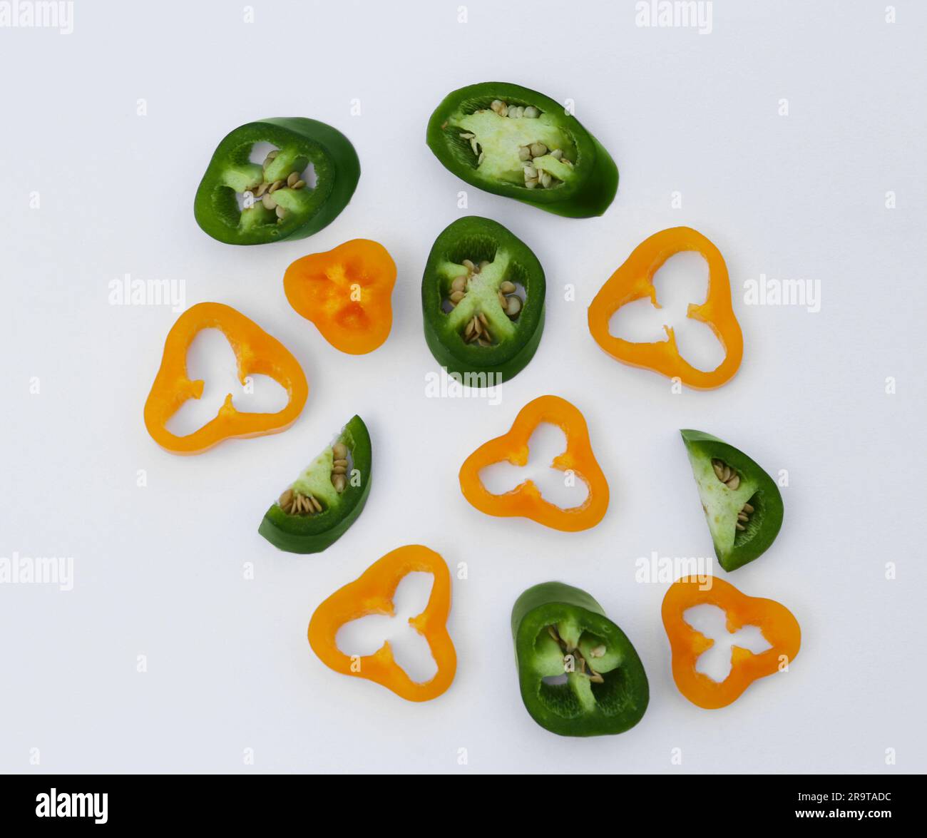 Different cut hot chili peppers on white background, flat lay Stock ...