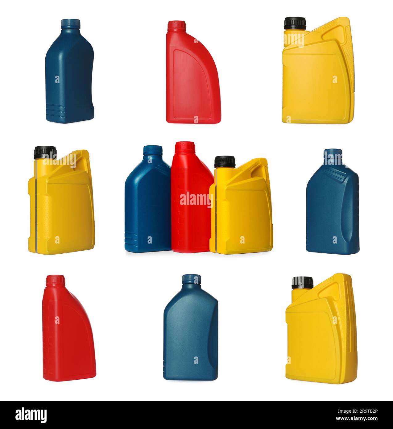 Colorful containers with different motor oil on white background ...