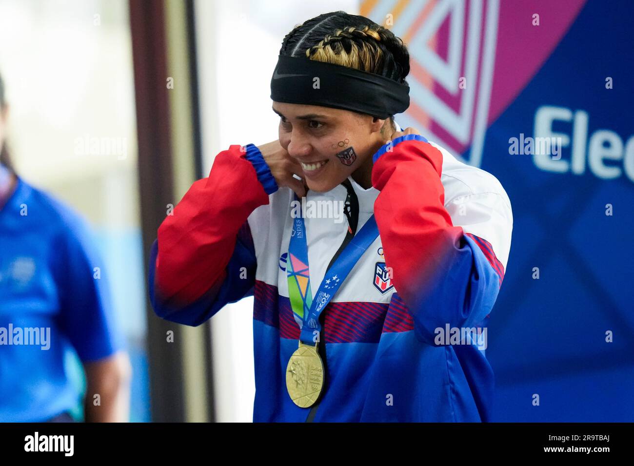 Gold medal winner Ashleyann Lozada of Puerto Rico smiles after the ...