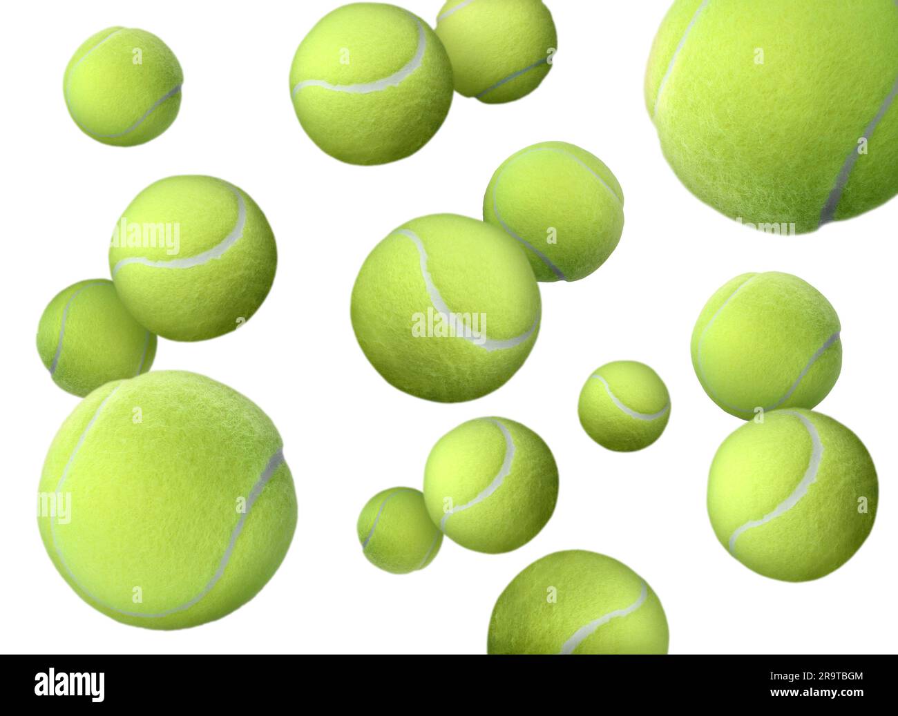 Many tennis balls falling on white background Stock Photo - Alamy