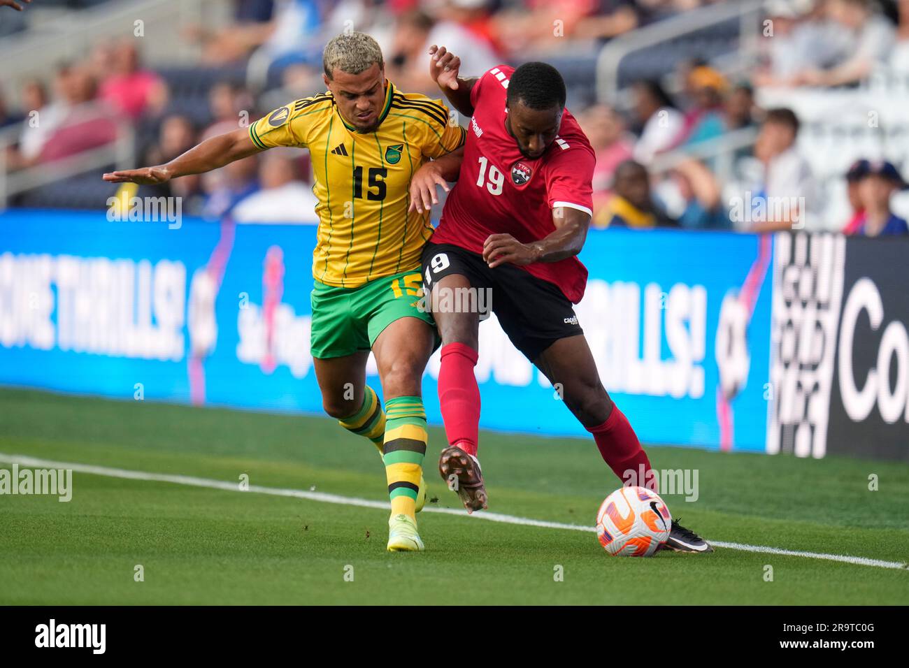 Jamaica's Joel Latibeaudiere (15) and Trinidad & Tobago's Malcolm Shaw ...