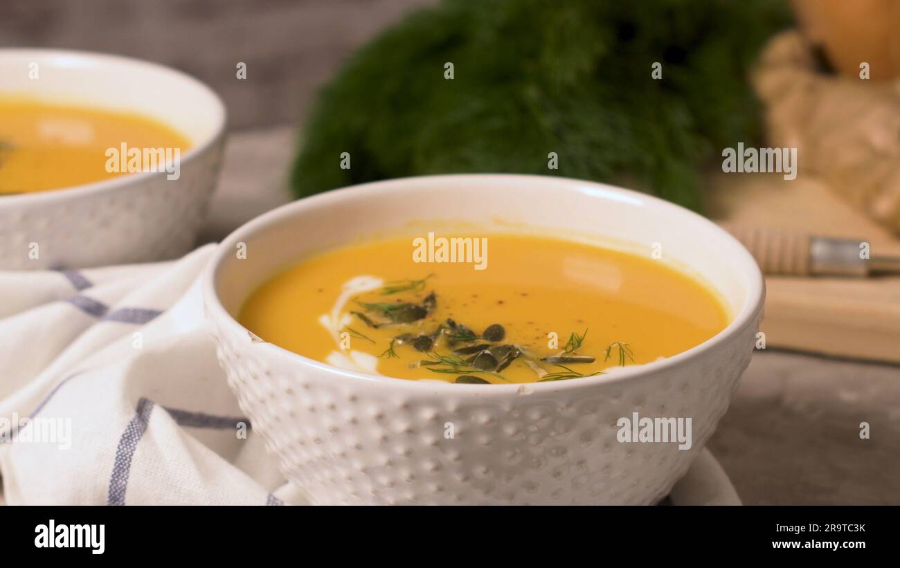 Delicious creamy homemade pumpkin soup with cream and pumpkin seed ...