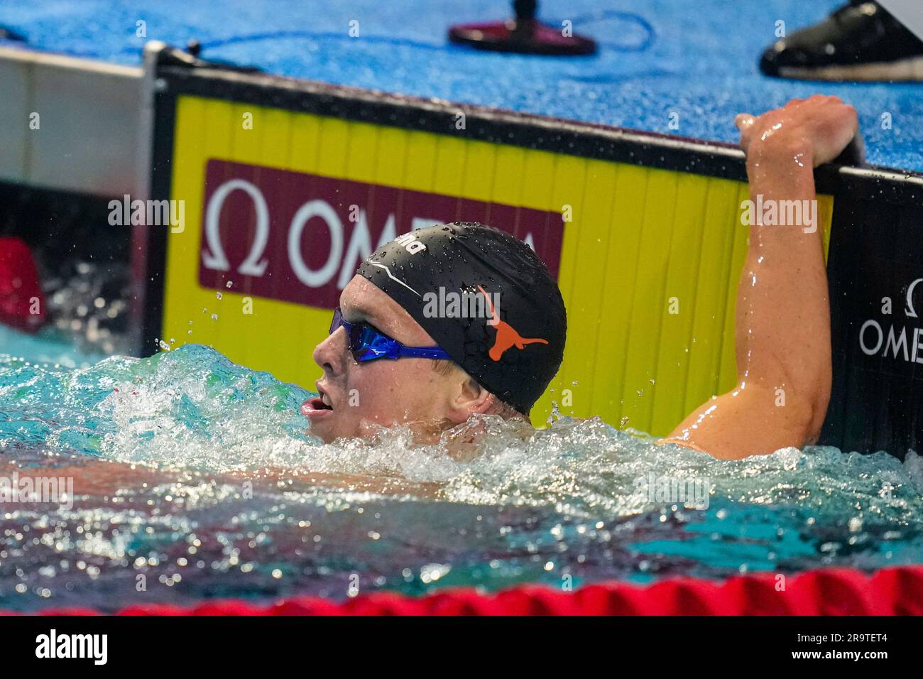 Luke Hobson checks his time after winning the men's 200-meter freestyle ...