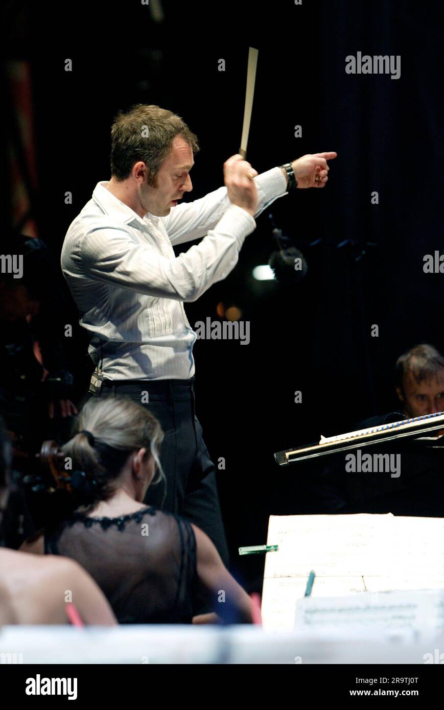 British conductor Charles Hazlewood conducts the Sydney Symphony ...
