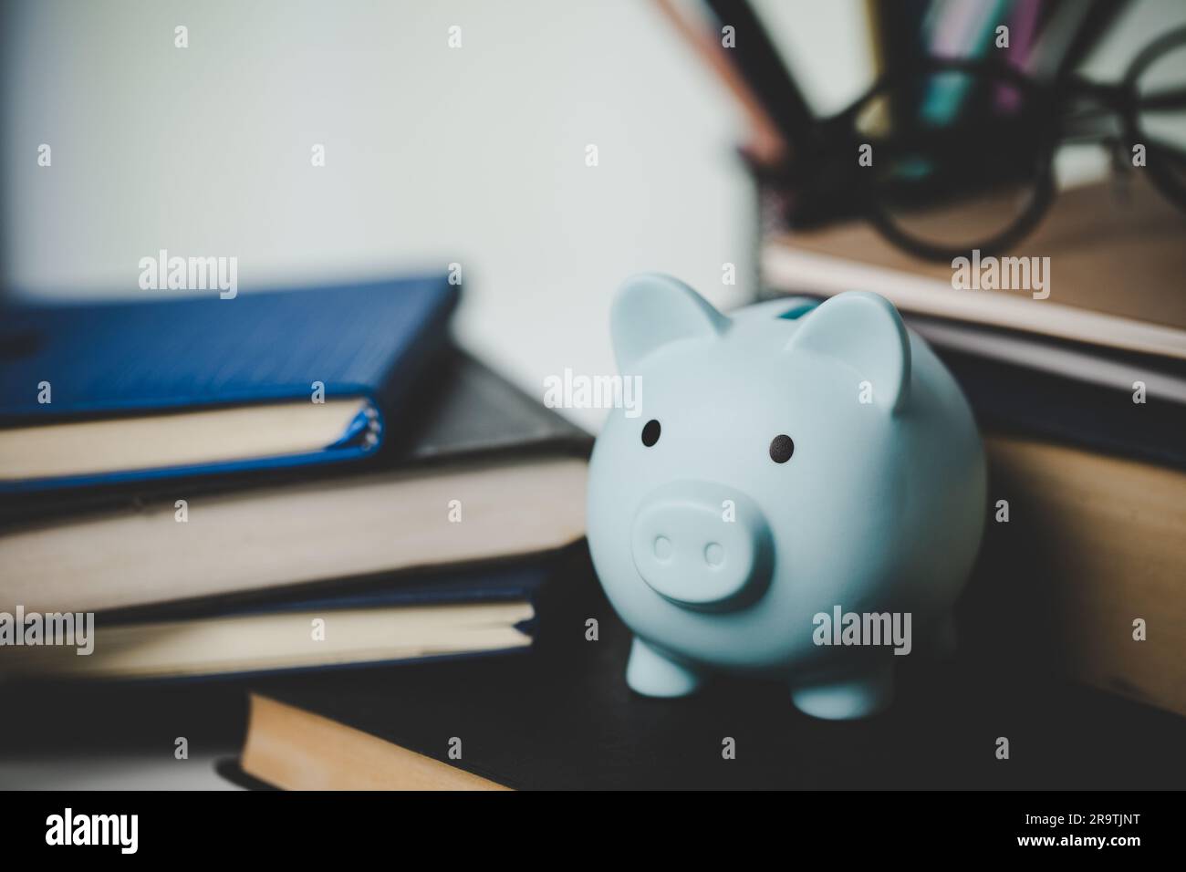 close-up education object with stack money coin-cash dollar and glass ...
