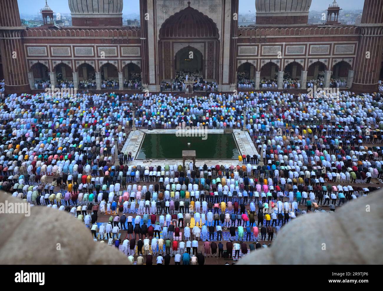 Muslims offer Eid al-Adha prayers at the Jama Masjid or Mosque, in New ...