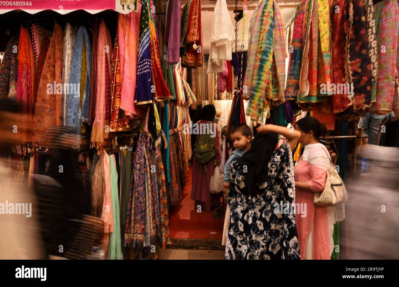 Srinagar, India. 28th June, 2023. Kashmirians do Shopping at the market ...