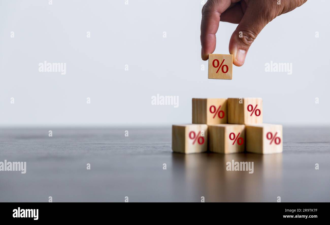 Closeup wood cubes with percentage symbol, Interest rate and dividend ...