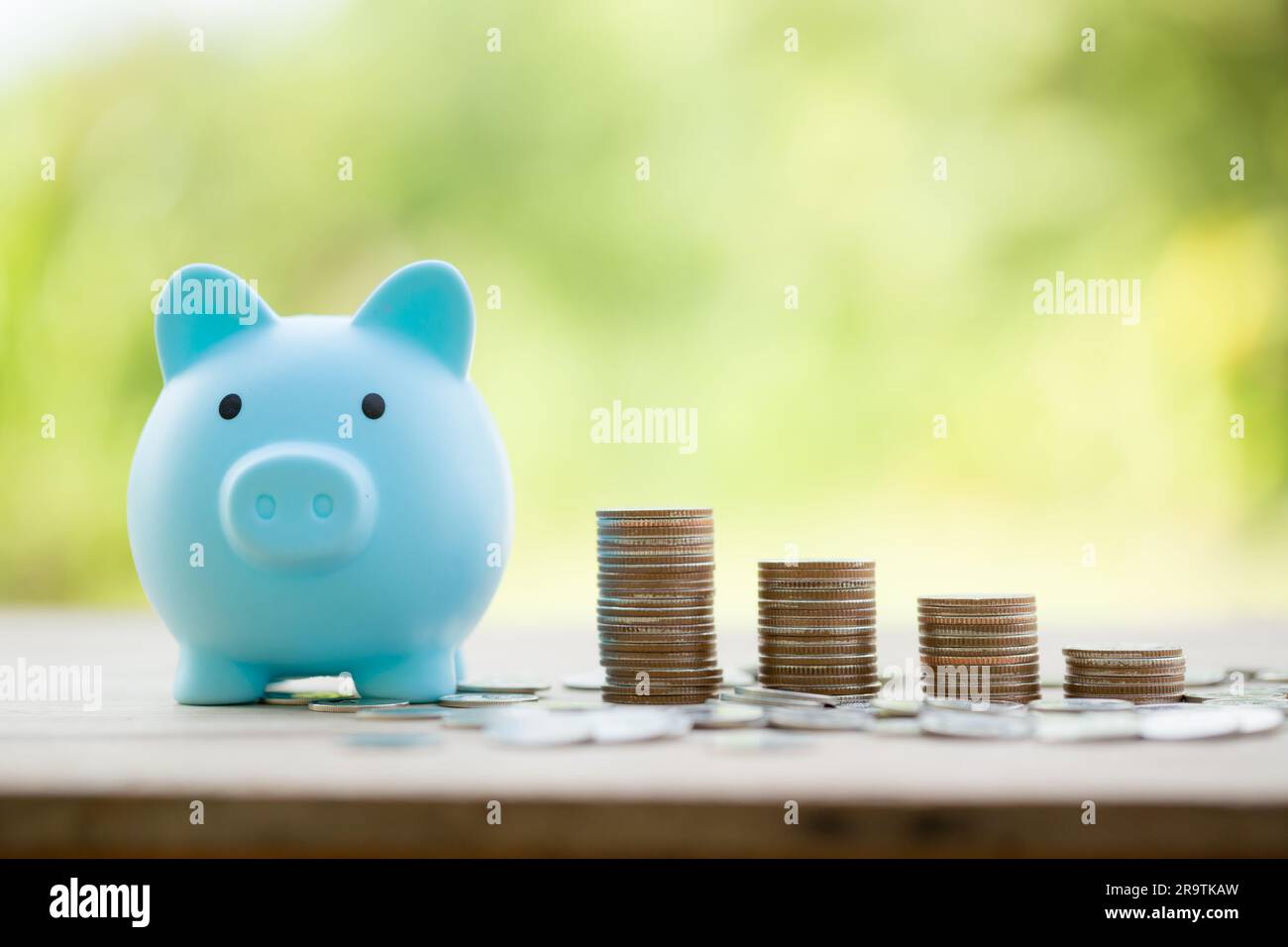 Savings for business investments concept. Money coin stacking on wood ...