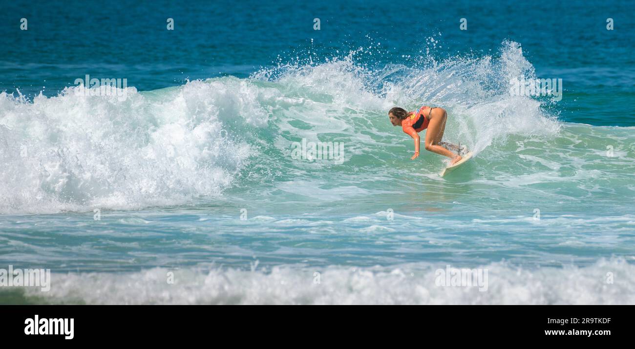 A young surfer competing in the Red Bull Ride My Wave championship in ...