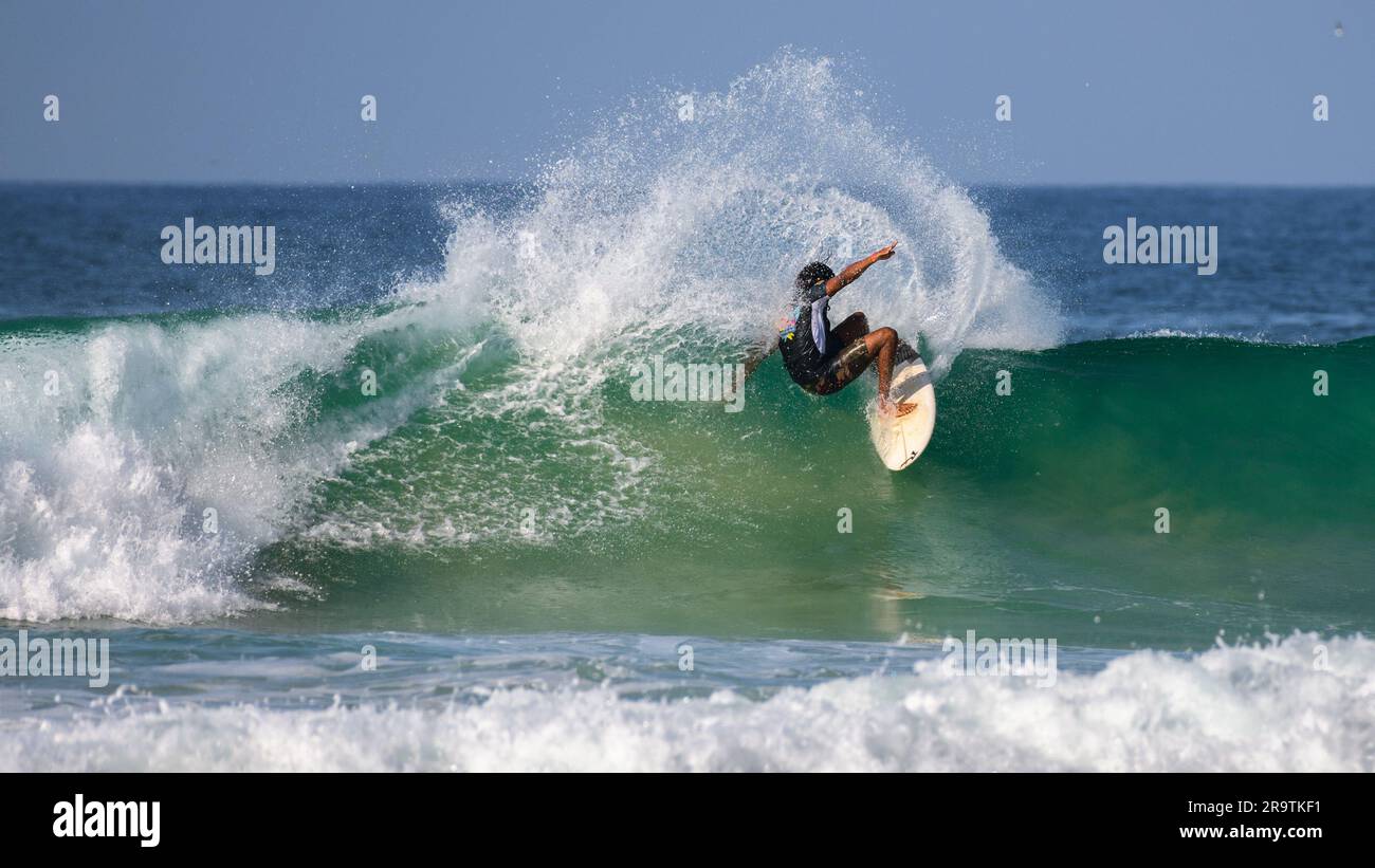 A young surfer competing in the Red Bull Ride My Wave championship in ...