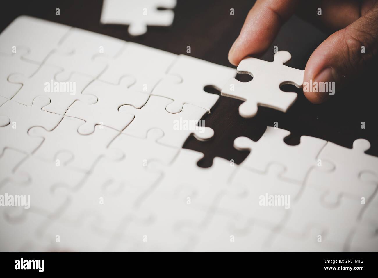 Business woman person hand with puzzle piece idea for strategy and ...