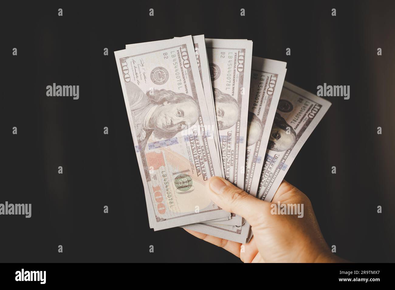 Banknote of 100 dollar bills in hands of rich woman person. Success ...