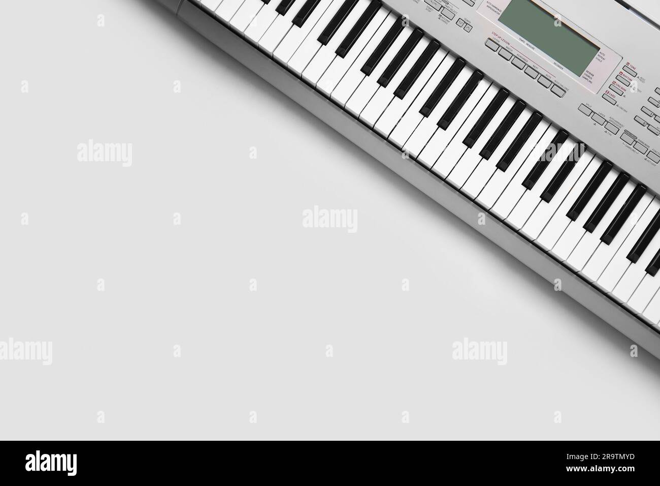 Modern synthesizer keyboard on white background Stock Photo - Alamy