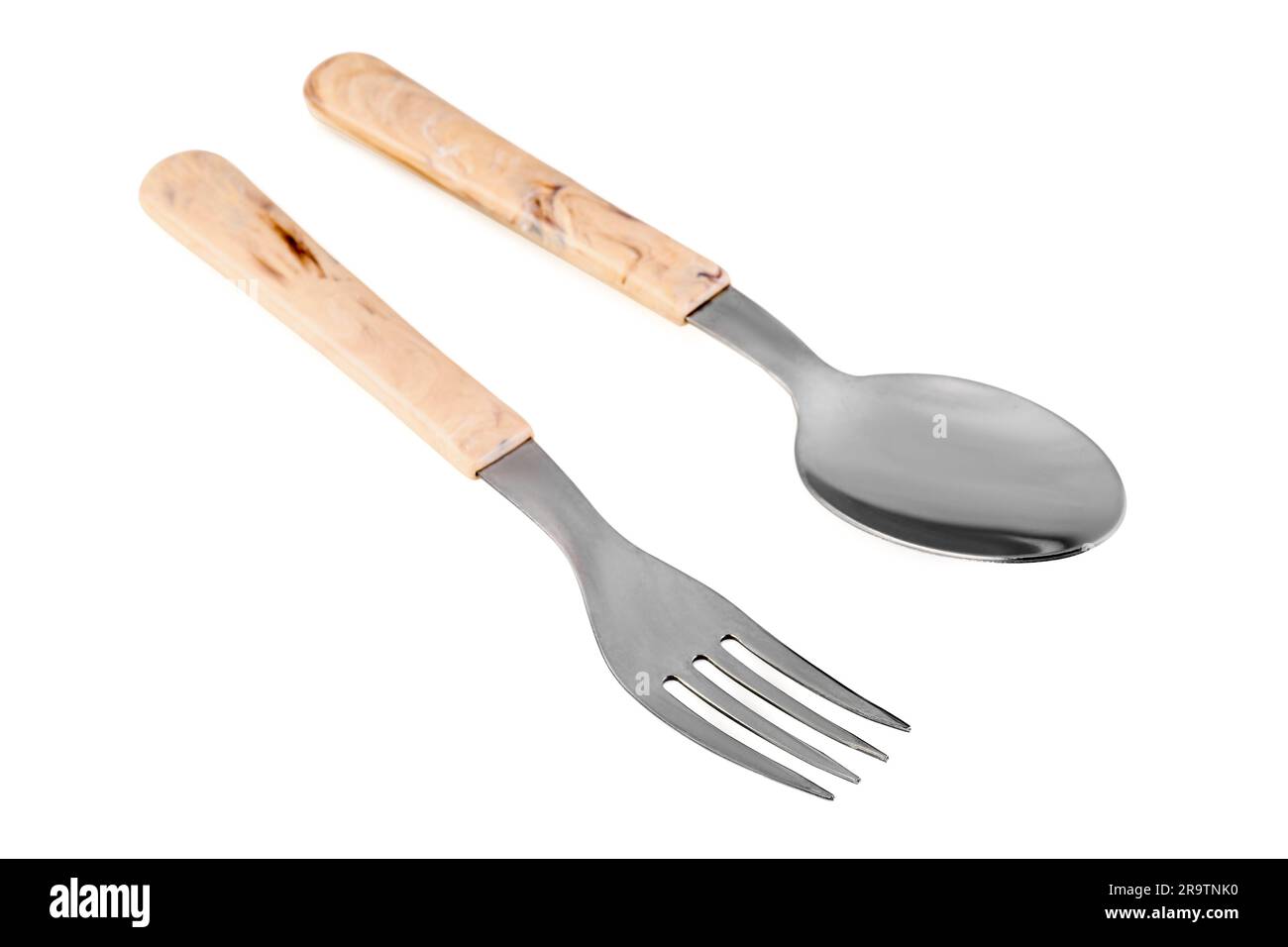 Stainless steel fork and knife with plastic handles on white background ...