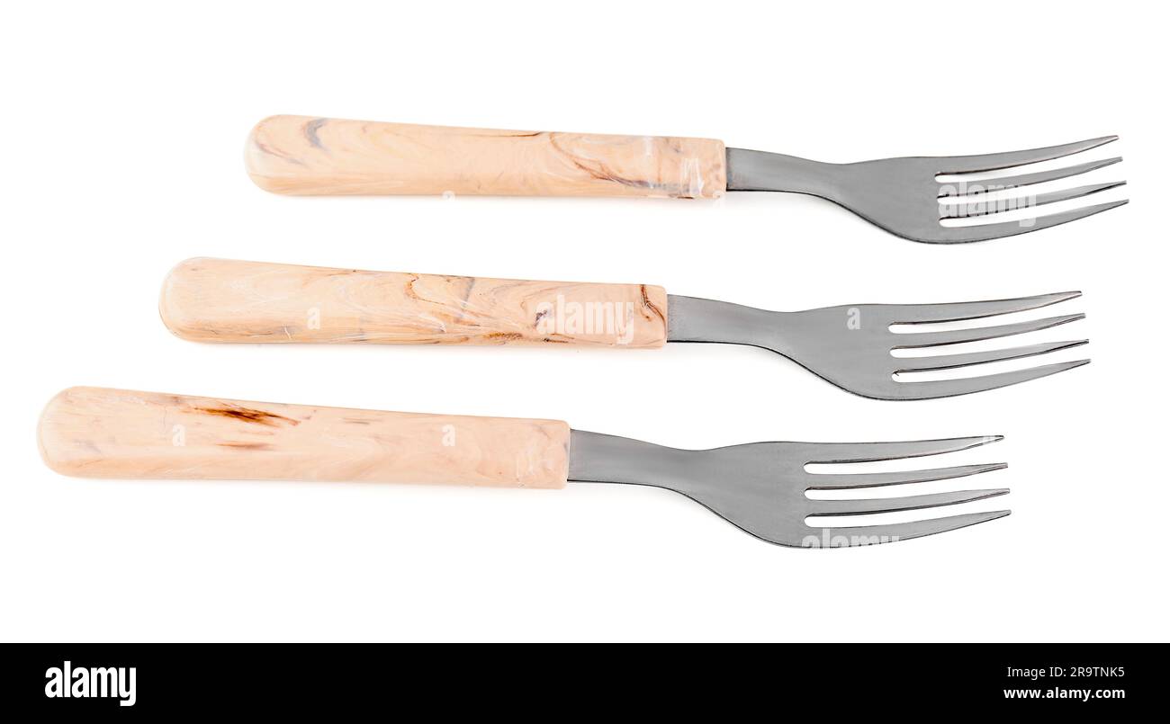 Stainless steel fork with plastic handles on white background Stock ...