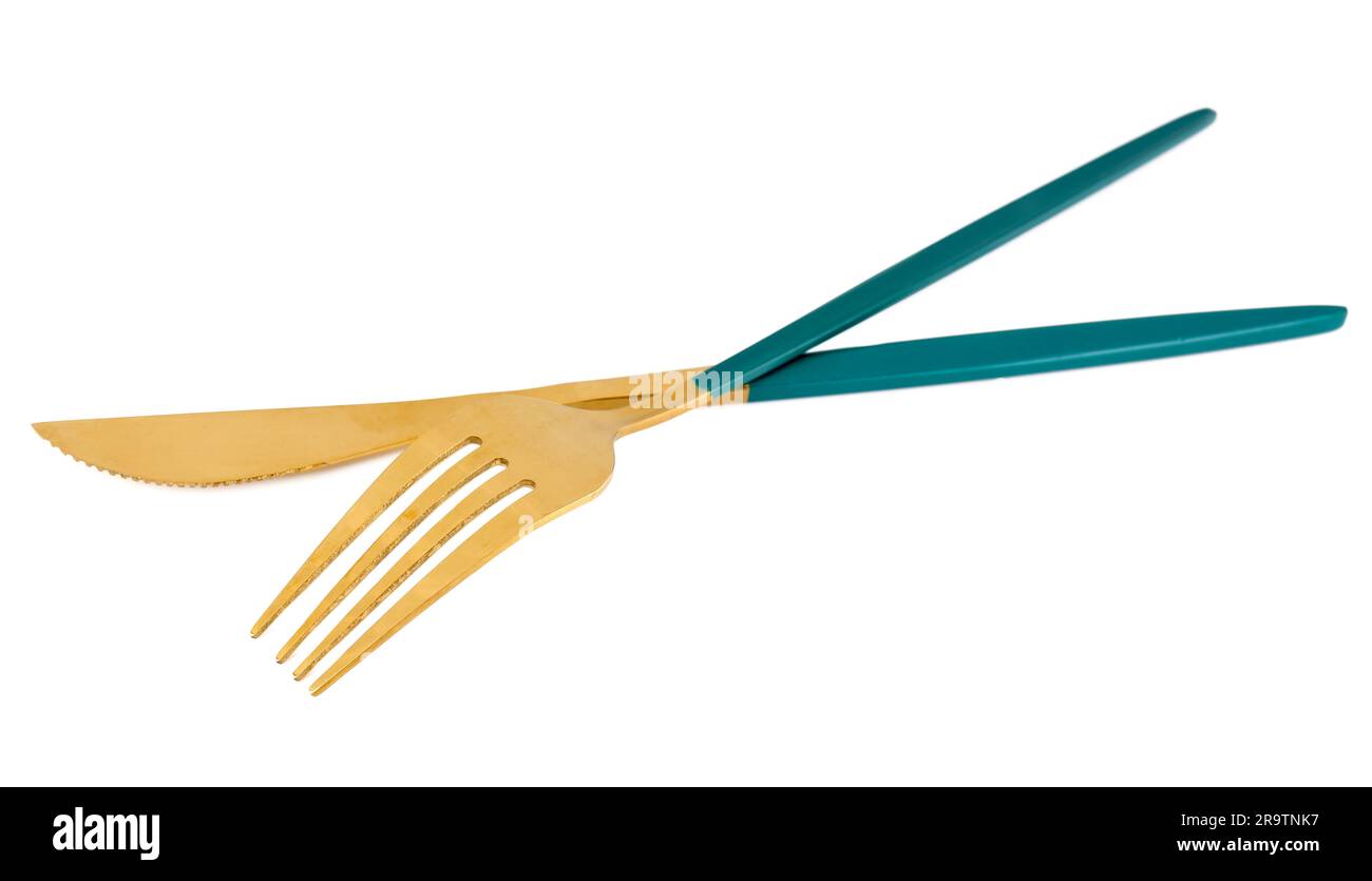 Golden fork and knife with green handles on white background Stock ...