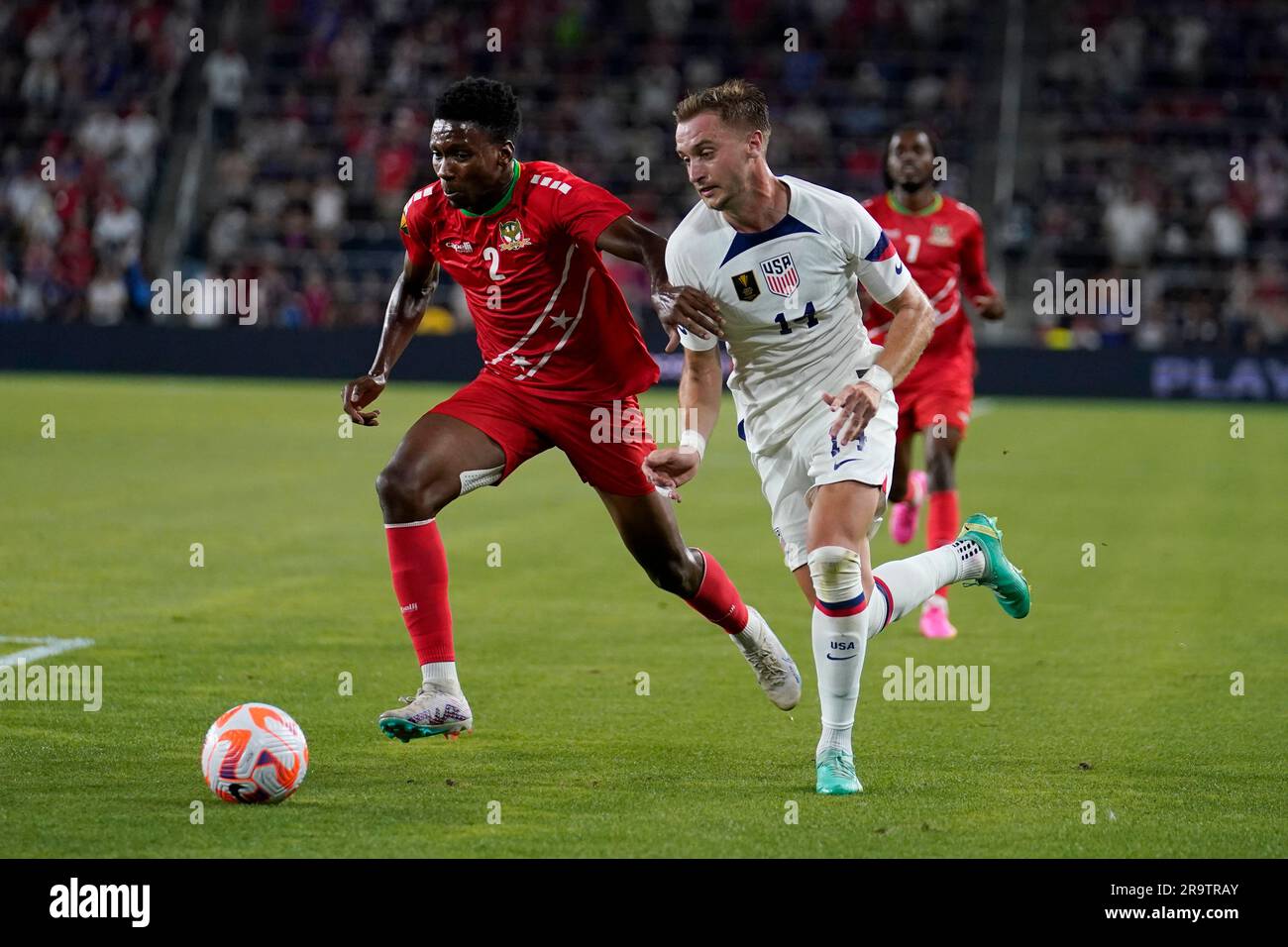 United States' Djordje Mihailovic (14) and St. Kitts & Nevis' Malique ...