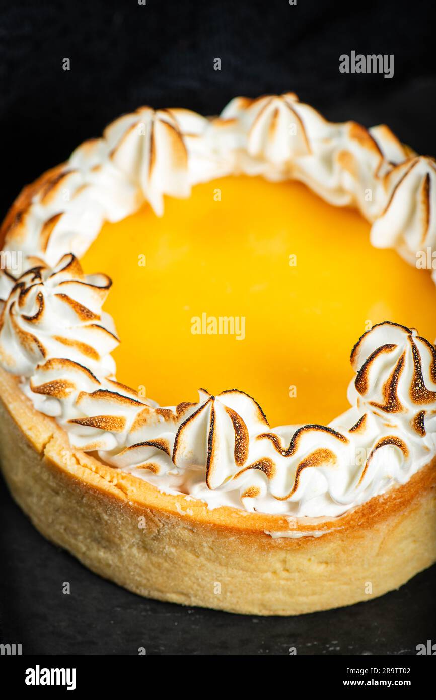 Lemon Meringue Pie made with shortcrust pastry, lemon curd, and torched ...