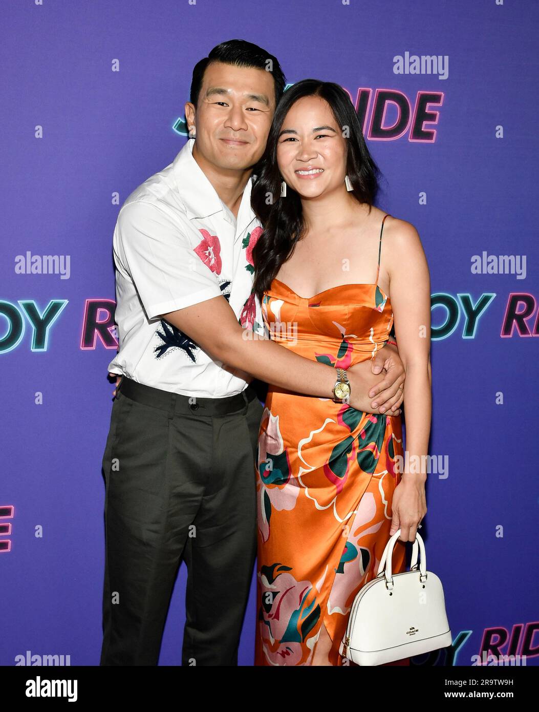 Ronny Chieng, left, and wife Hannah Pham attend the special screening ...