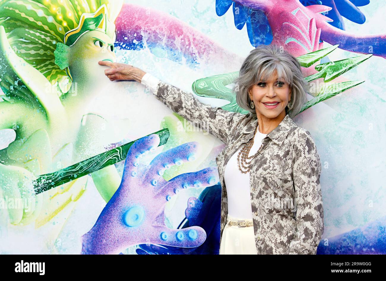 Jane Fonda, a cast member in "Ruby Gillman, Teenage Kraken," points to an illustration of her ...