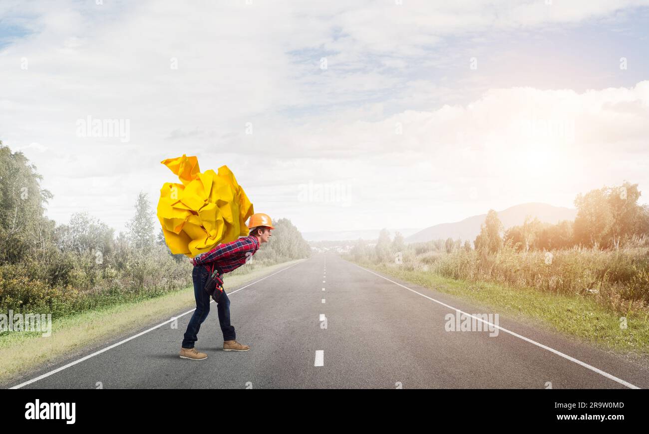 Engineer man carry load Stock Photo - Alamy