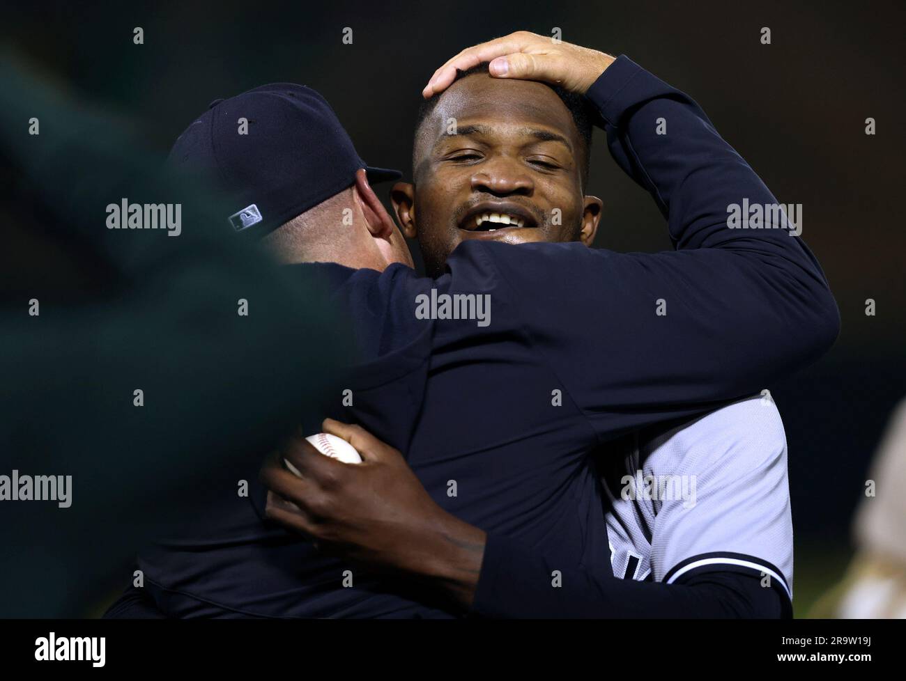 New York Yankees pitcher Domingo Germán, right, is congratulated after ...