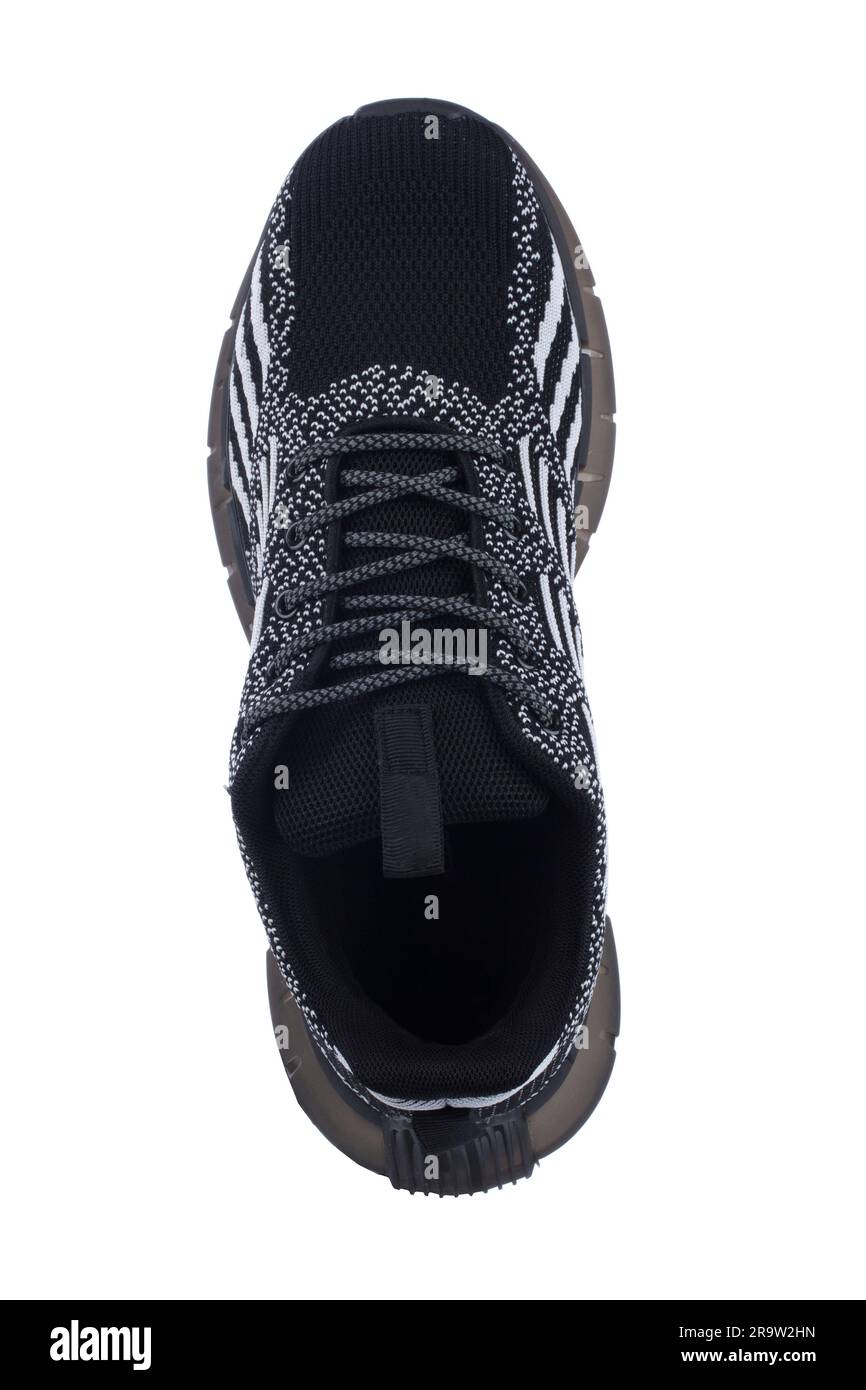 Black rag sneaker on a white background Stock Photo - Alamy