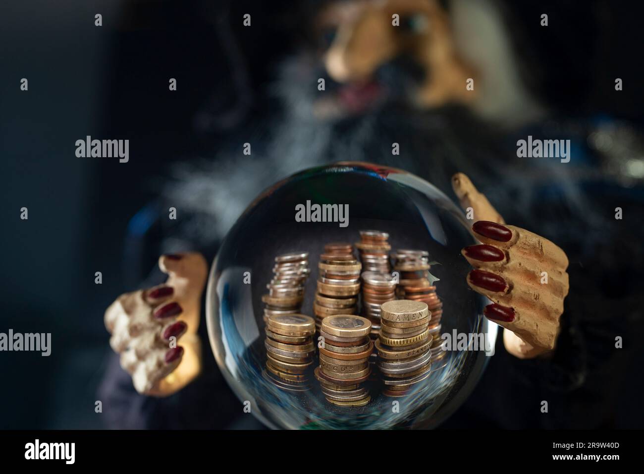 wizard toy holding a crystal ball, predicting wealth and lots of money ...