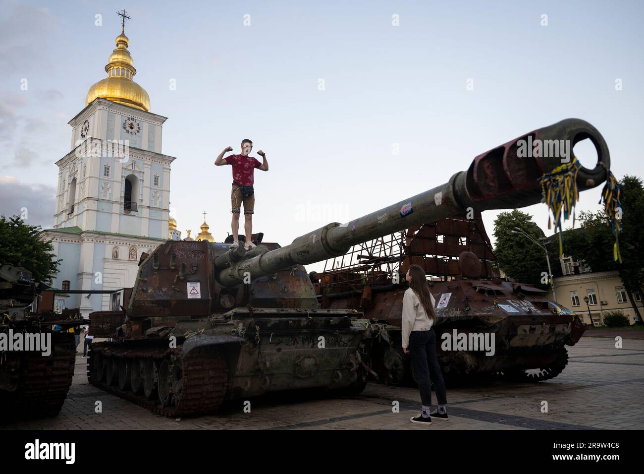 Kiev, Ukraine. 28th June, 2023. A man stands on a destroyed Russian ...