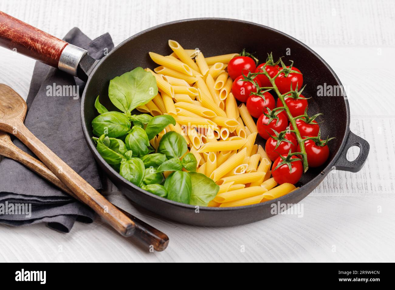 A vibrant representation of the Italian flag made with pasta, basil ...