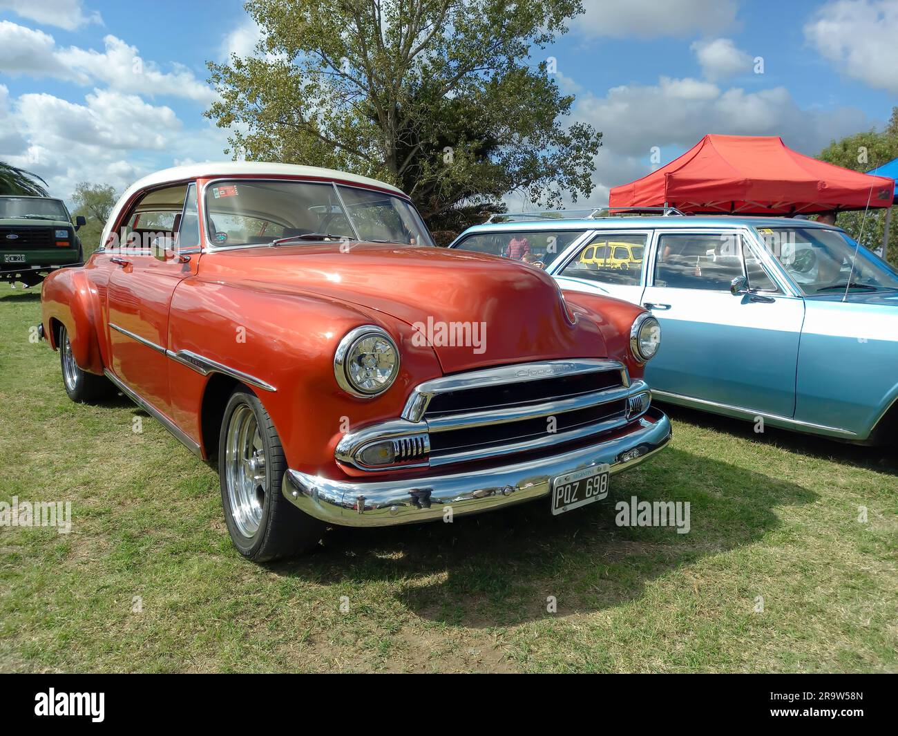 An old 1951 red Chevrolet Deluxe Styleline Bel Air hardtop convertible ...
