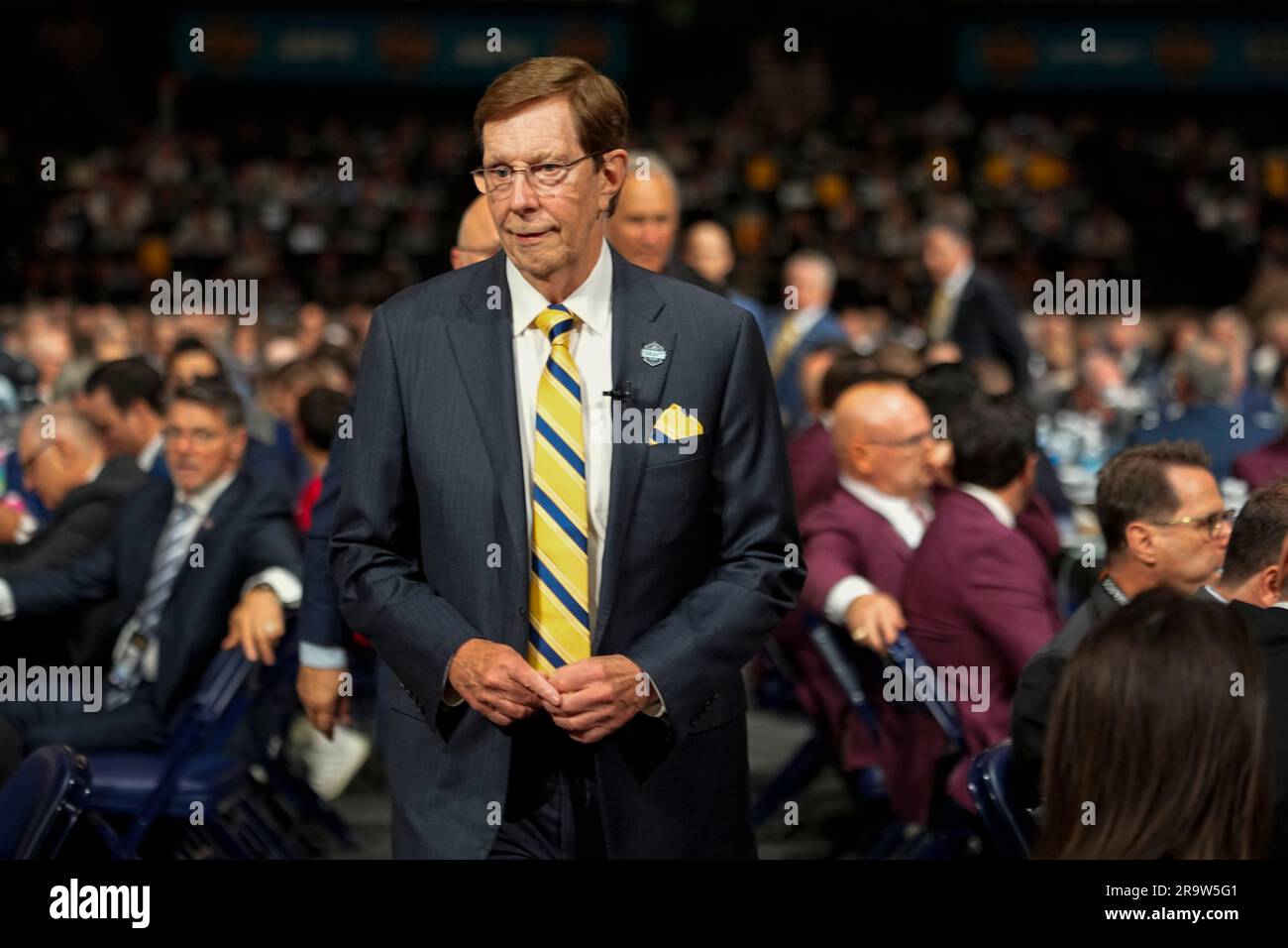Nashville Predators retiring general manager David Poile walks to the ...