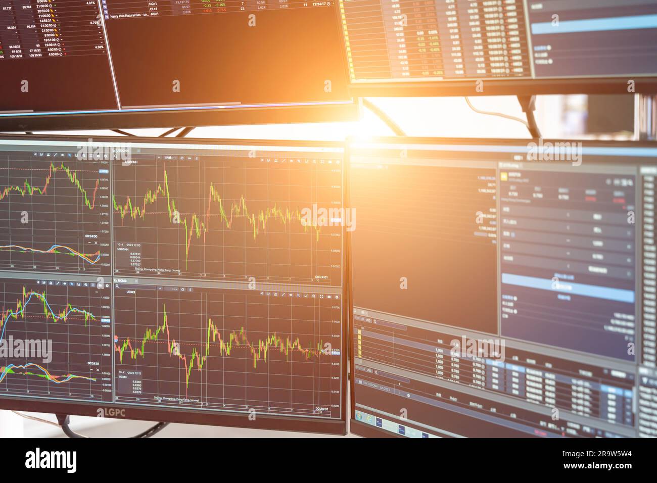 close view of stock market trending screens in modern office. success ...