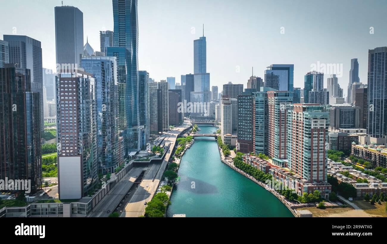 Chicago River at downtown with its iconic buildings around - aerial ...