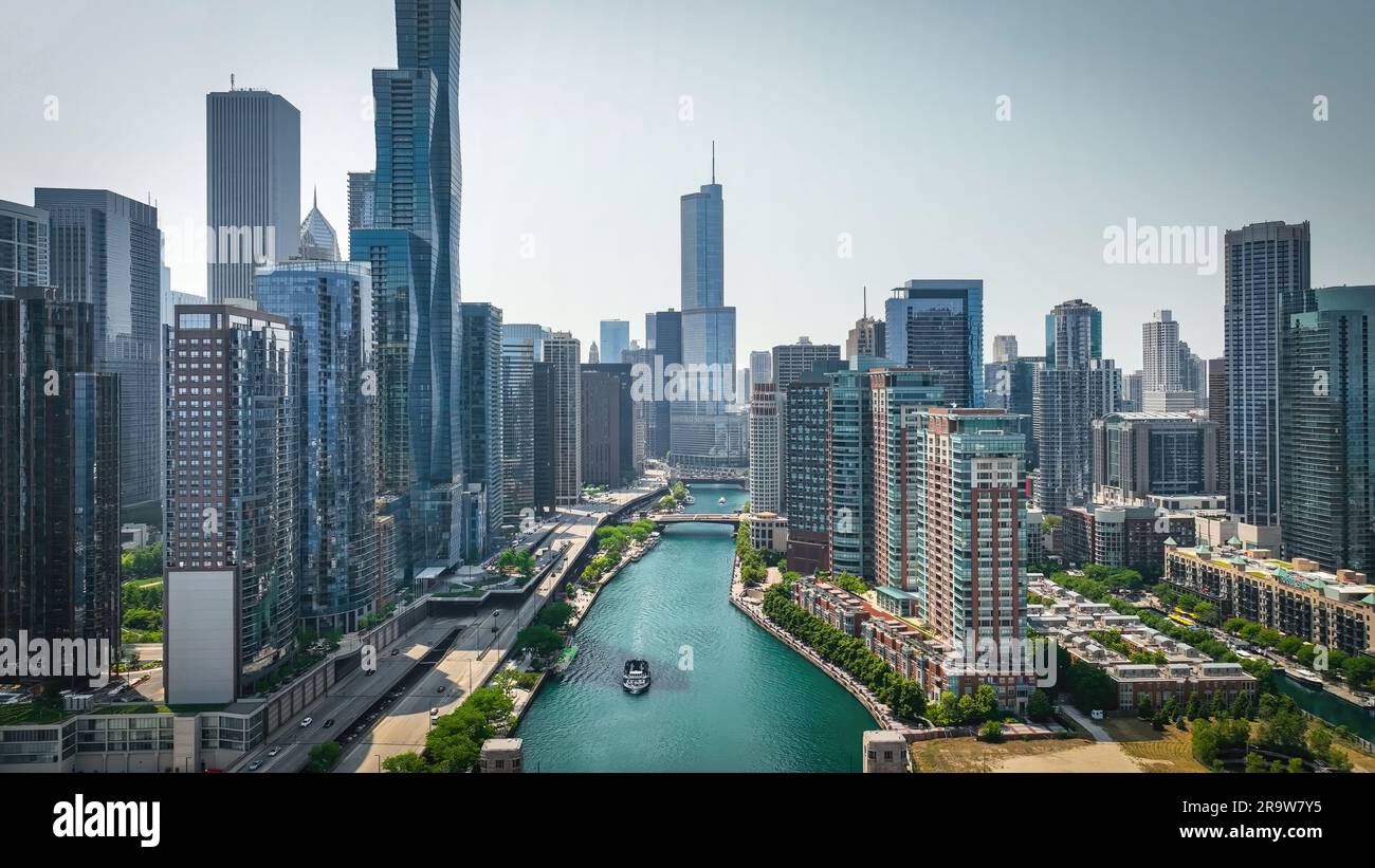 Chicago River at downtown with its iconic buildings around - aerial ...